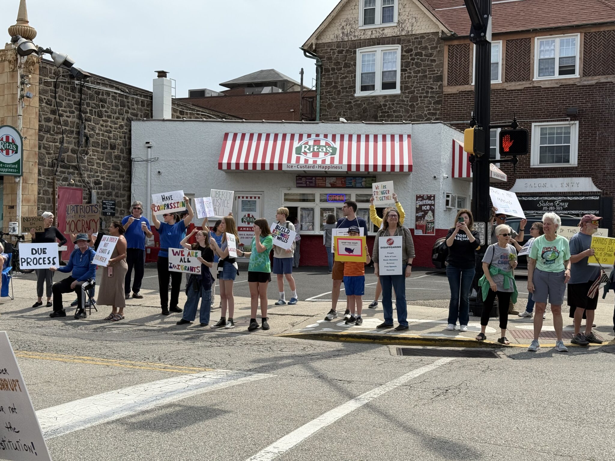 Protestors lined intersection in Ambler for protest against Trump ...
